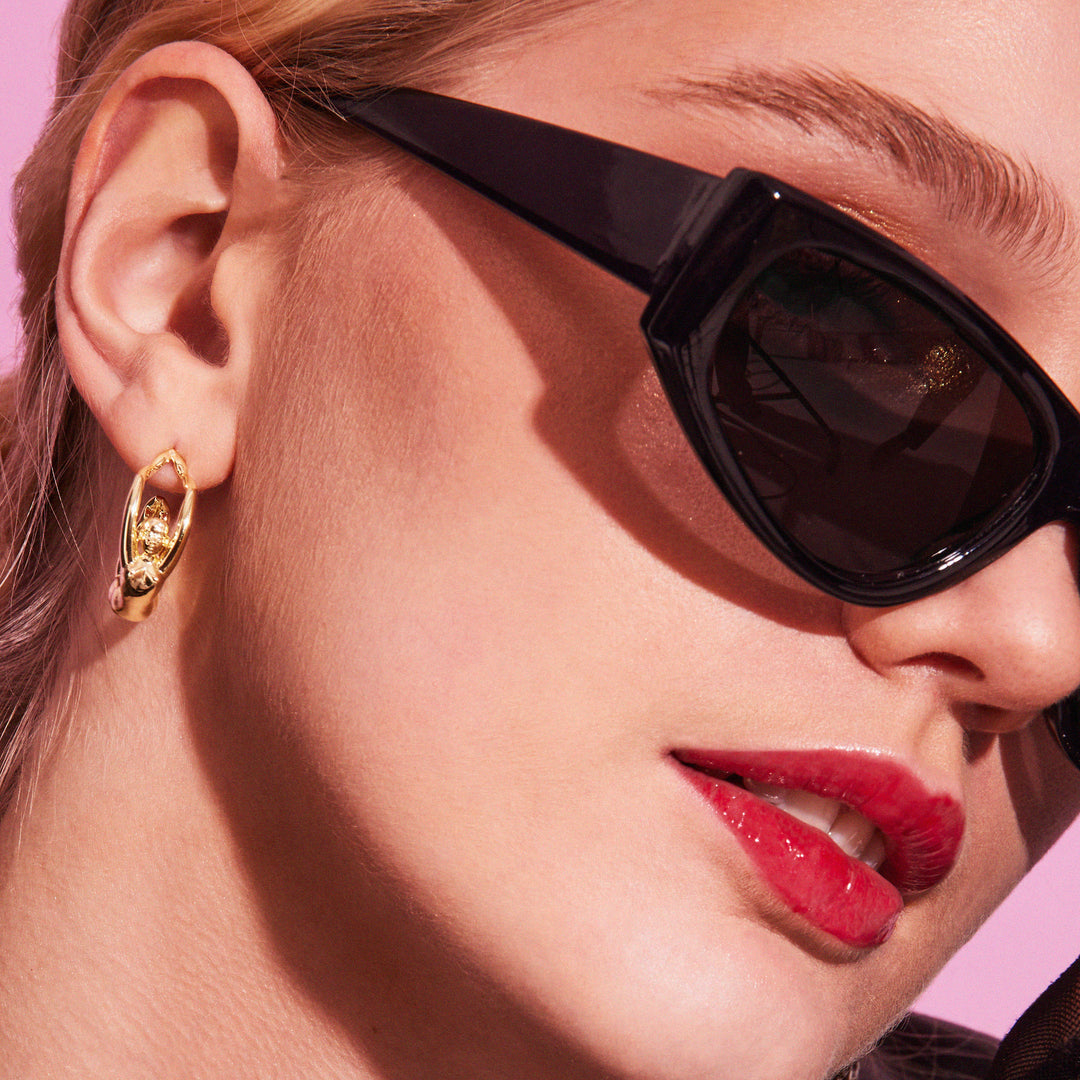 FREE WOMAN LOOP ÖRHÄNGEN – IOAKU by Fanny Ek